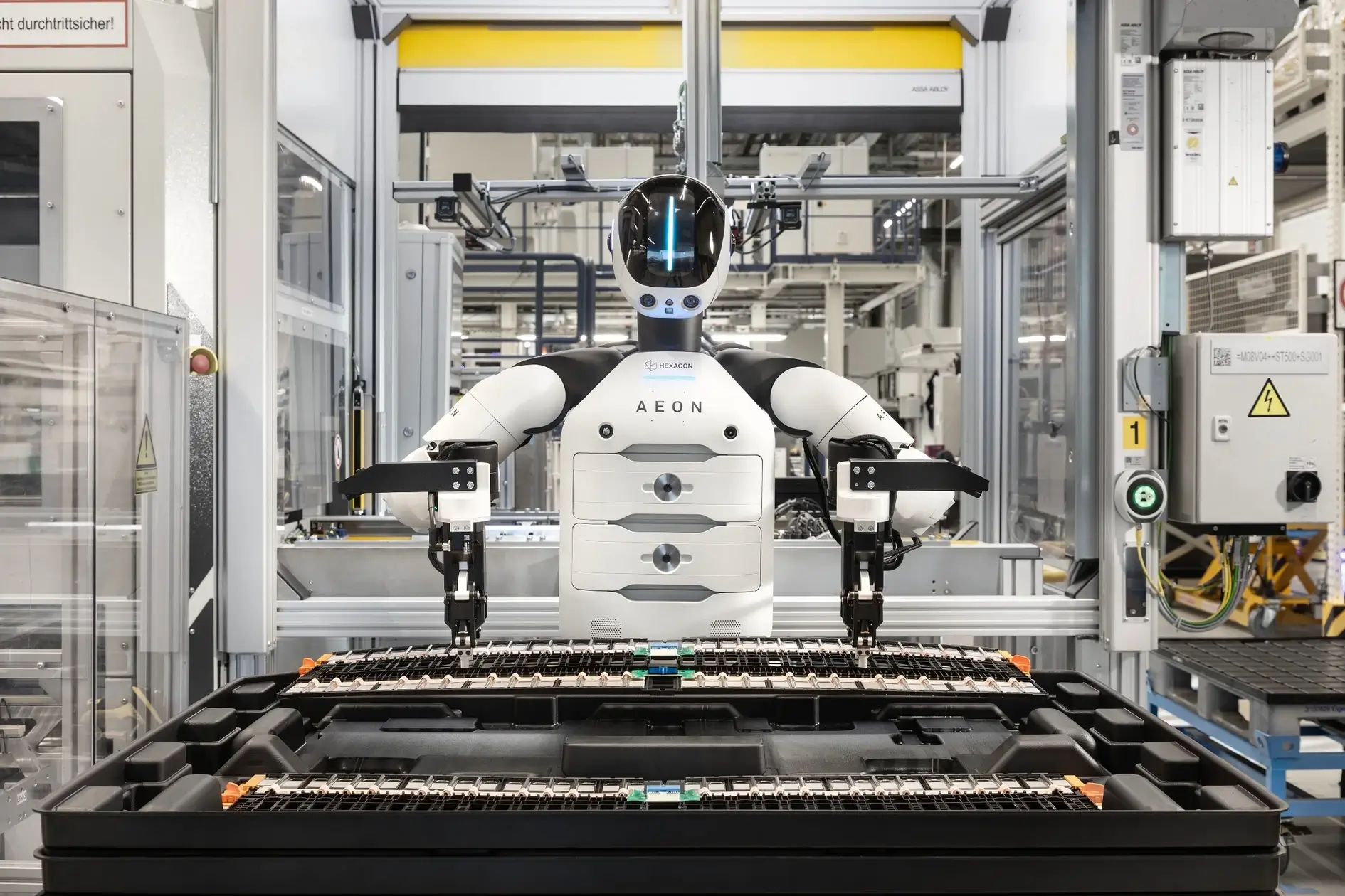 BMW Deploys Humanoid Robots in Production - AutoTech News